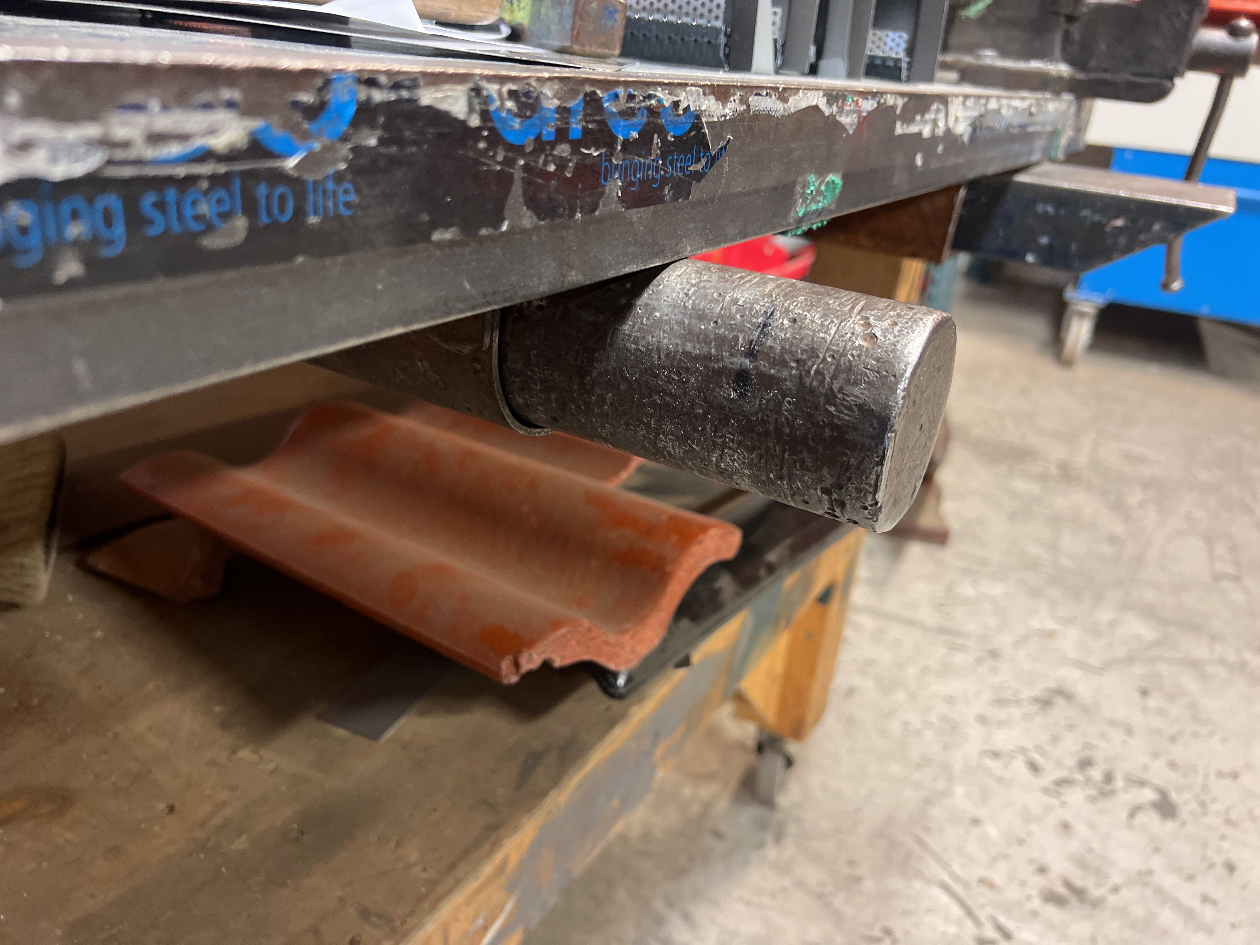 Sheet metal workbench on wheels with fixed vise and sheet metal work ...