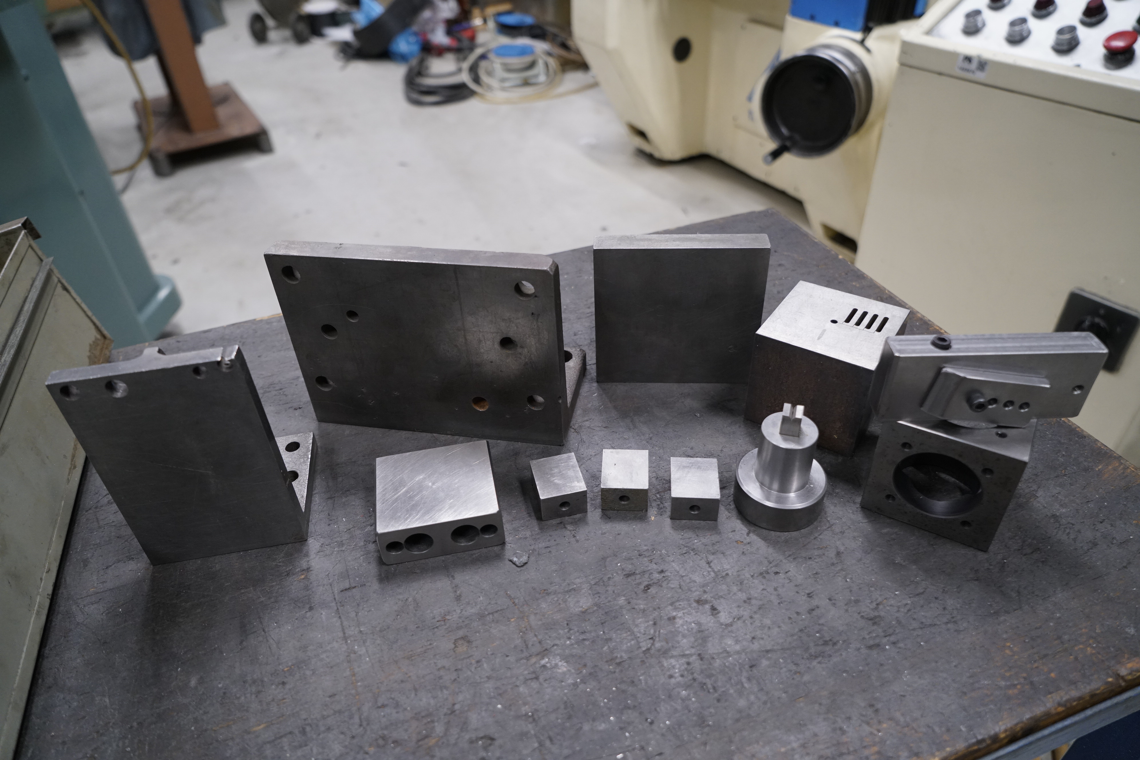 Set of ground steel blocks – various shapes and sizes - PS Auction - We ...