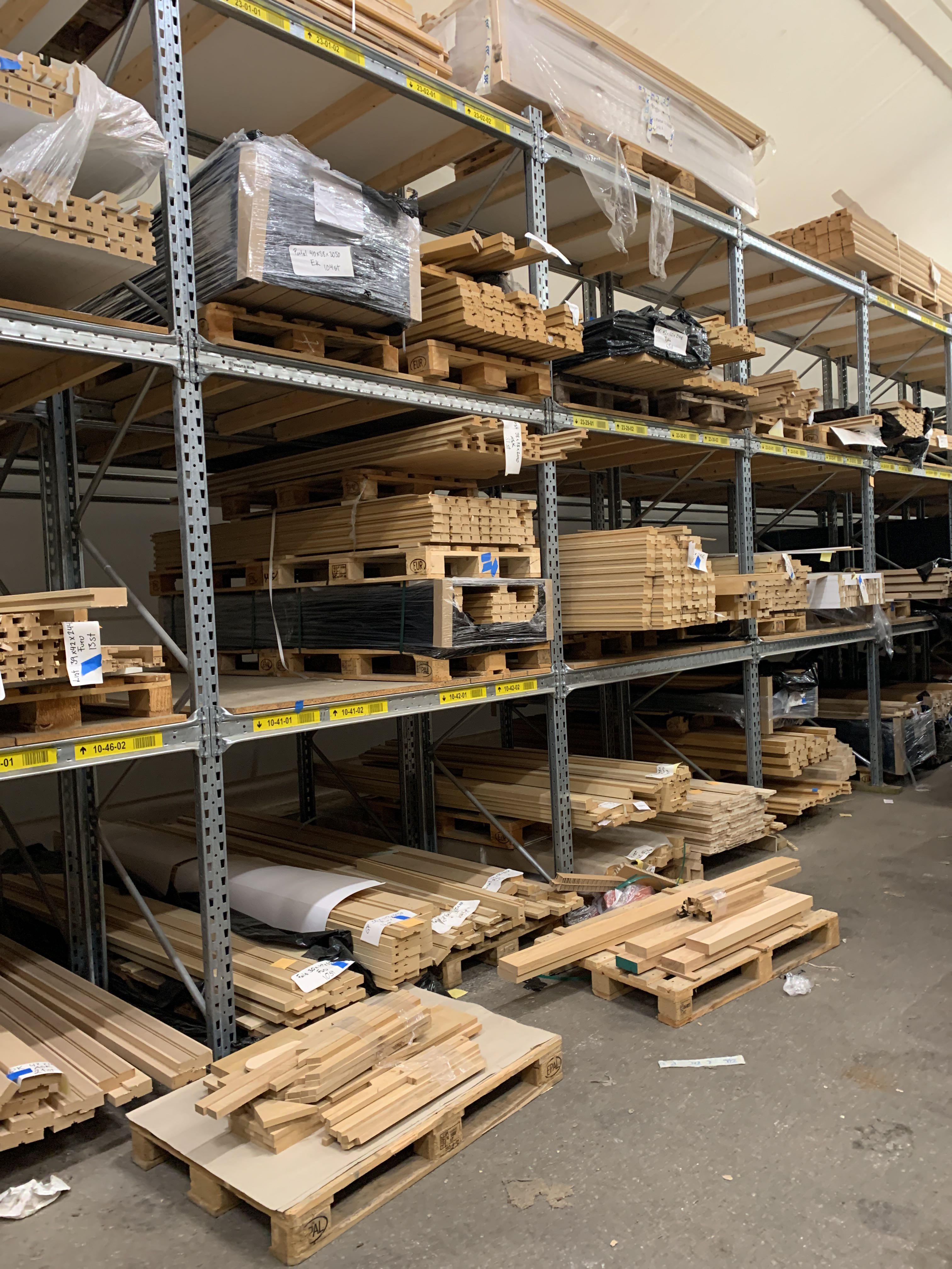 Lot of wooden strips, aluminum strips and other material for office ...