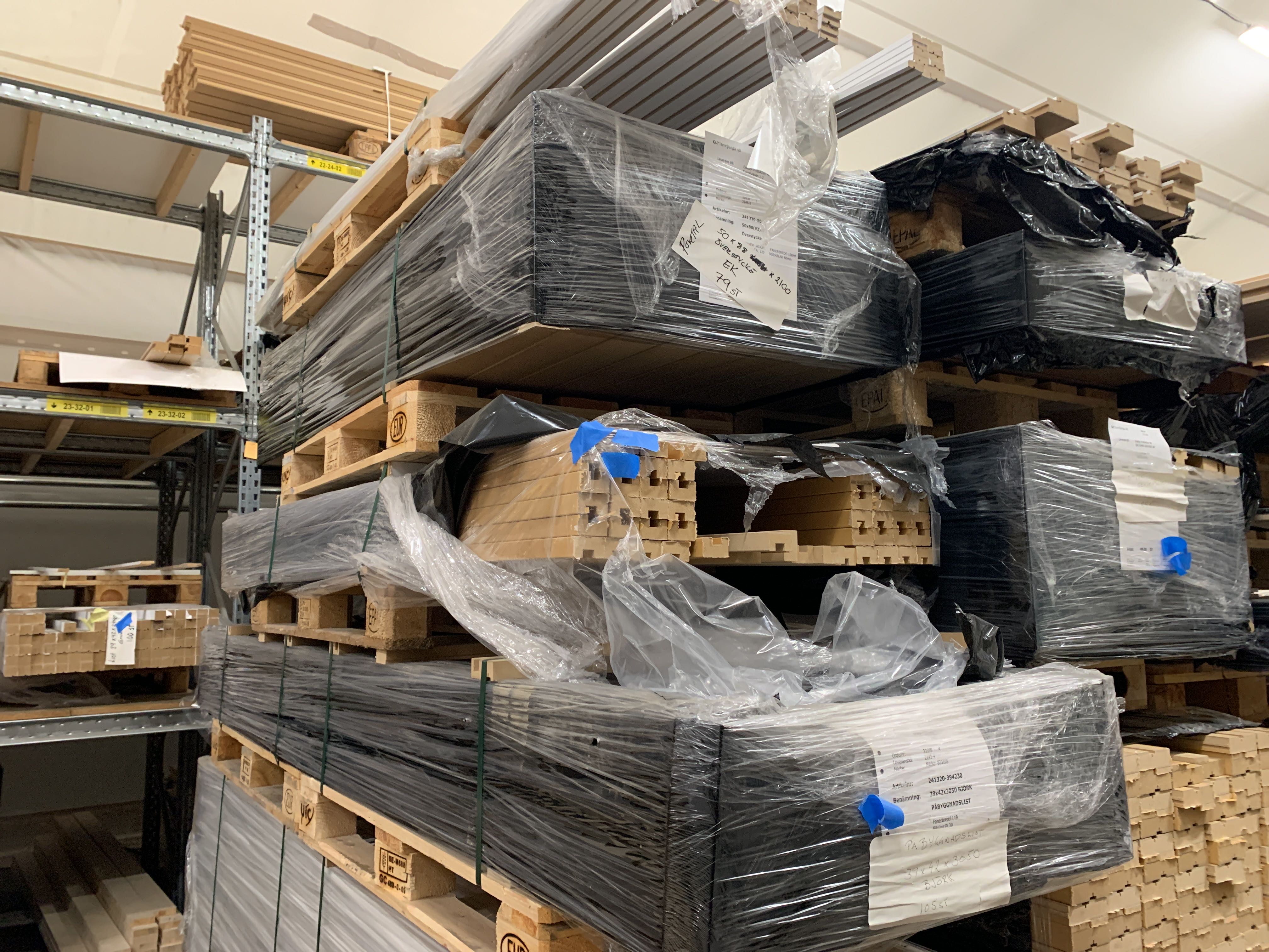 Lot of wooden strips, aluminum strips and other material for office ...
