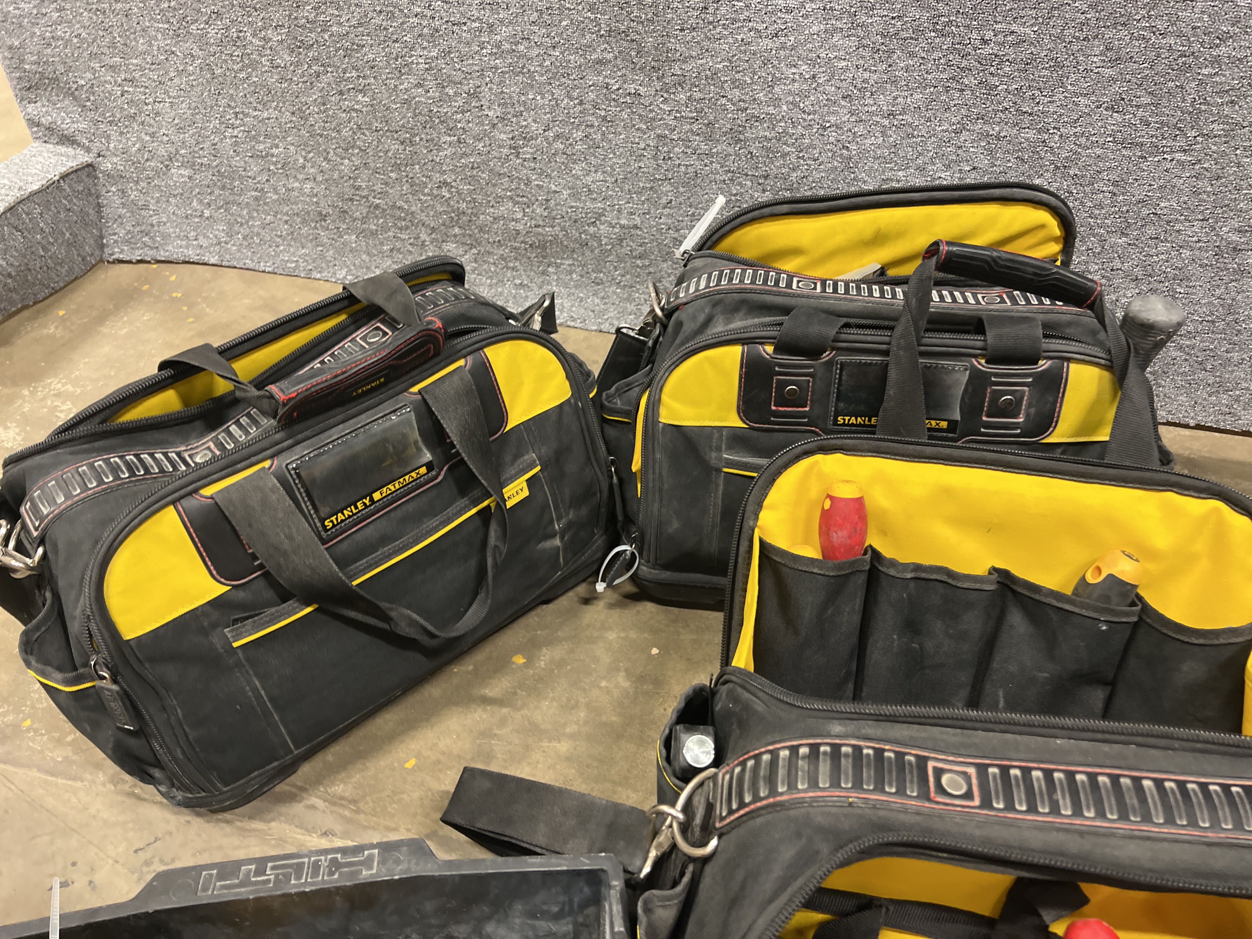 Toolbox with various tools and construction accessories - PS Auction ...