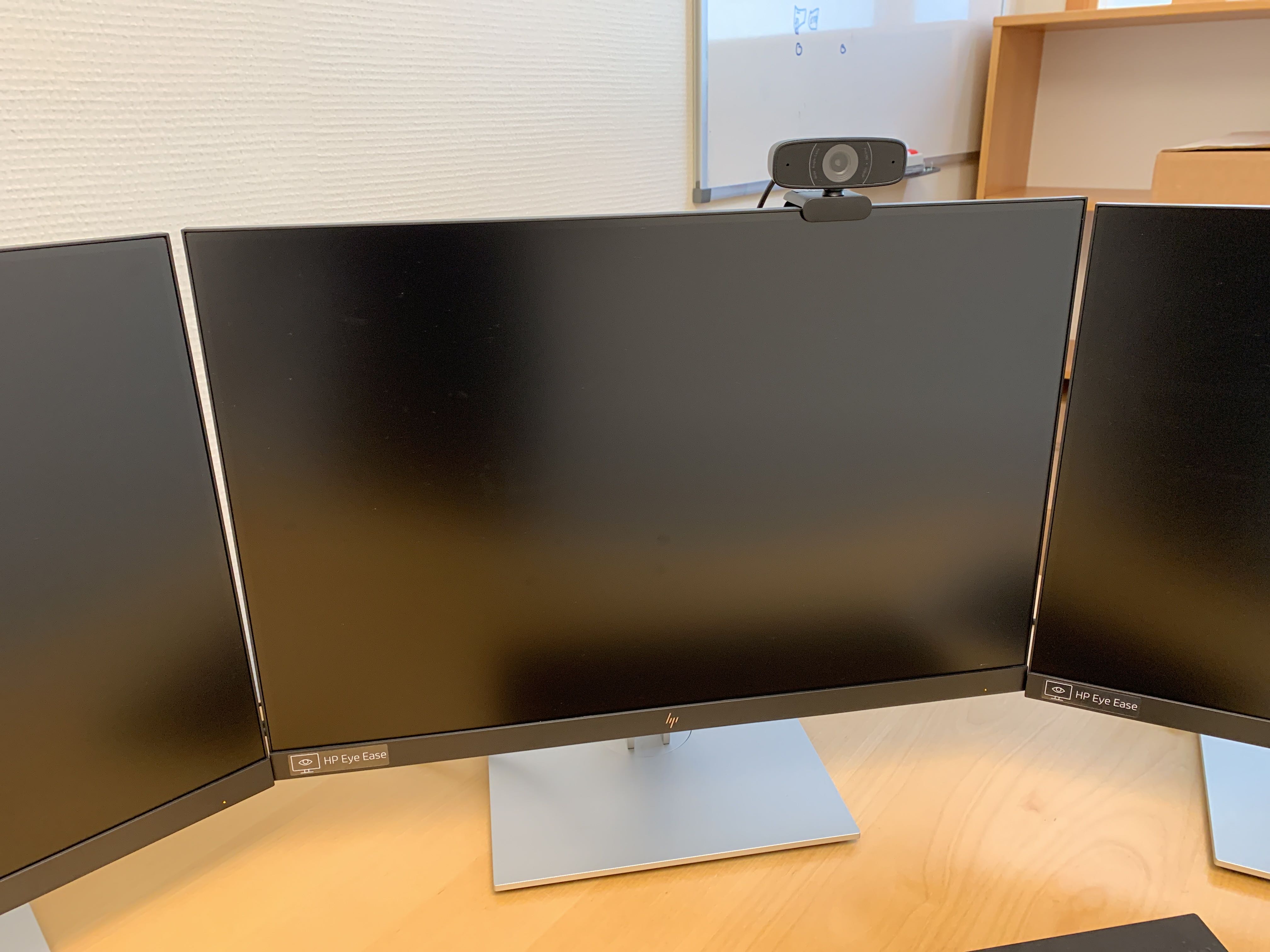 Office furniture: Electric raise/lower desk, 4 HP computer monitors ...