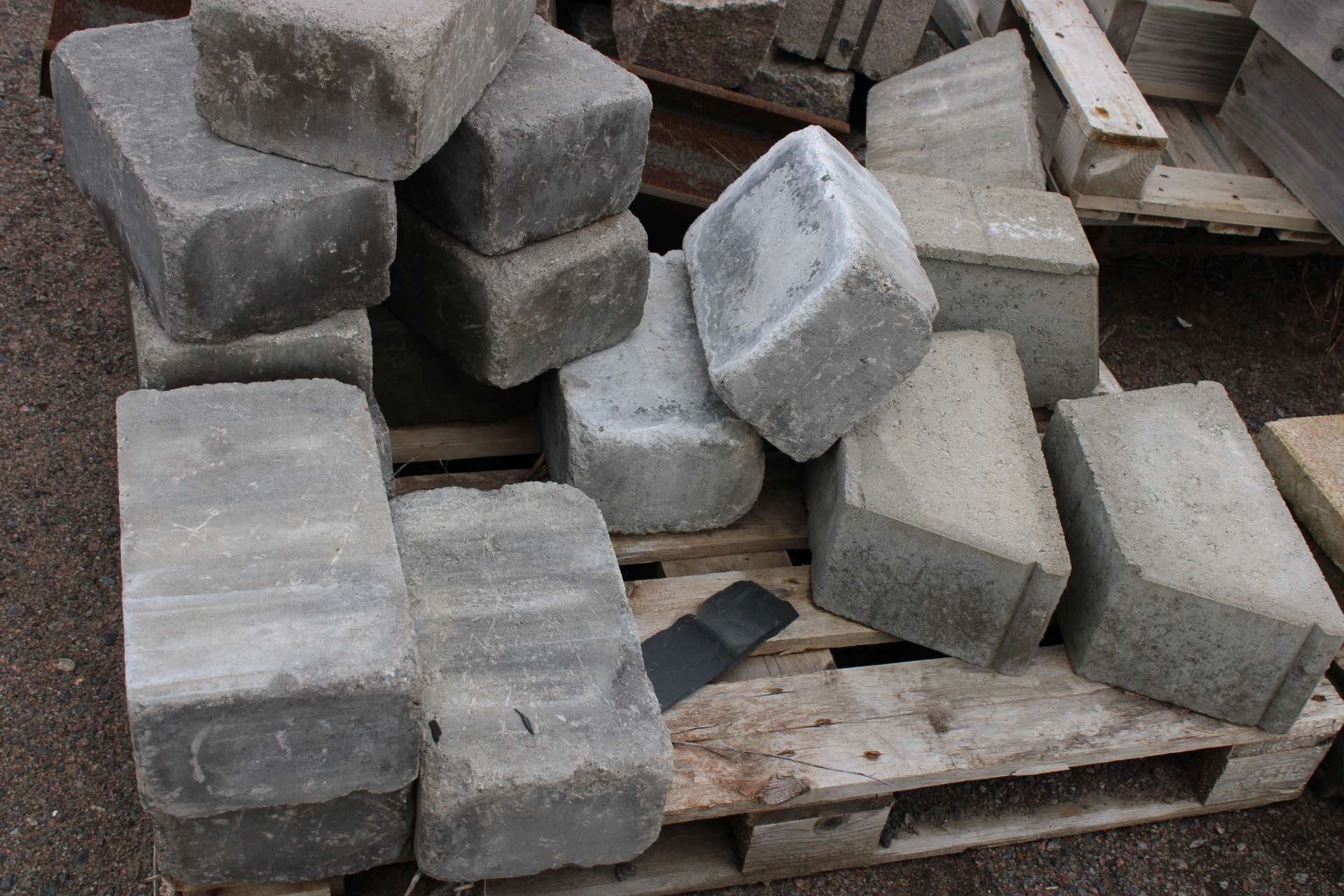 Pallets with different types of stone, tiles, paving stones etc. - PS ...
