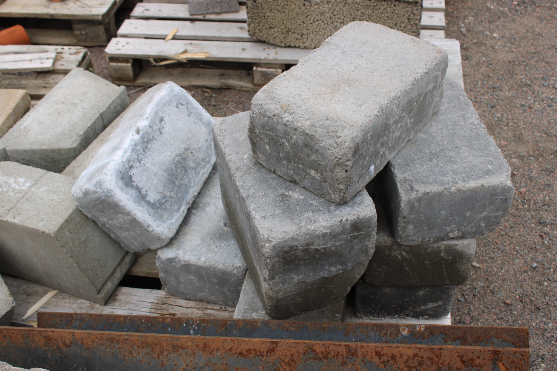Pallets with different types of stone, tiles, paving stones etc. - PS ...