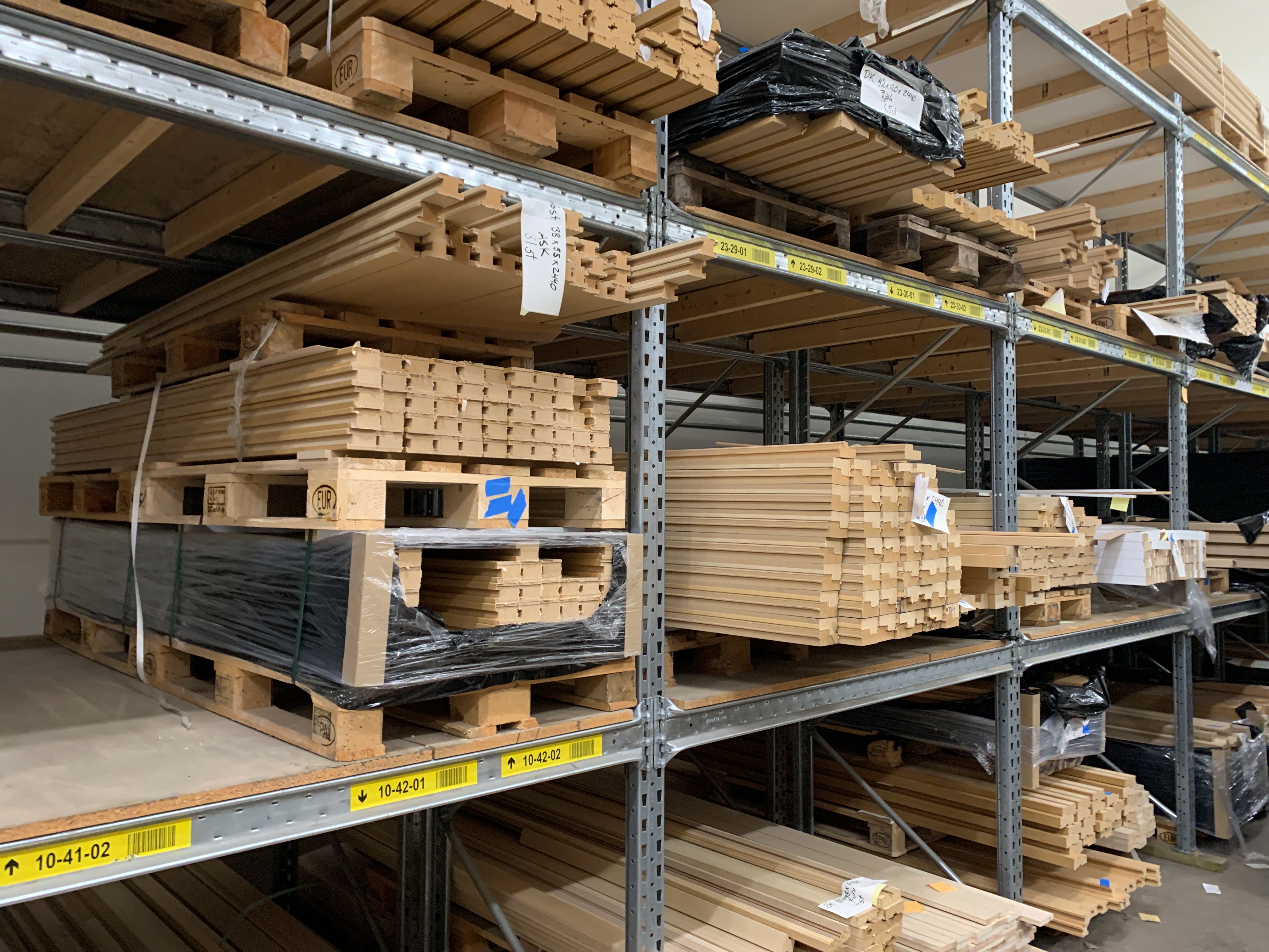 Lot of wooden strips, aluminum strips and other material for office ...