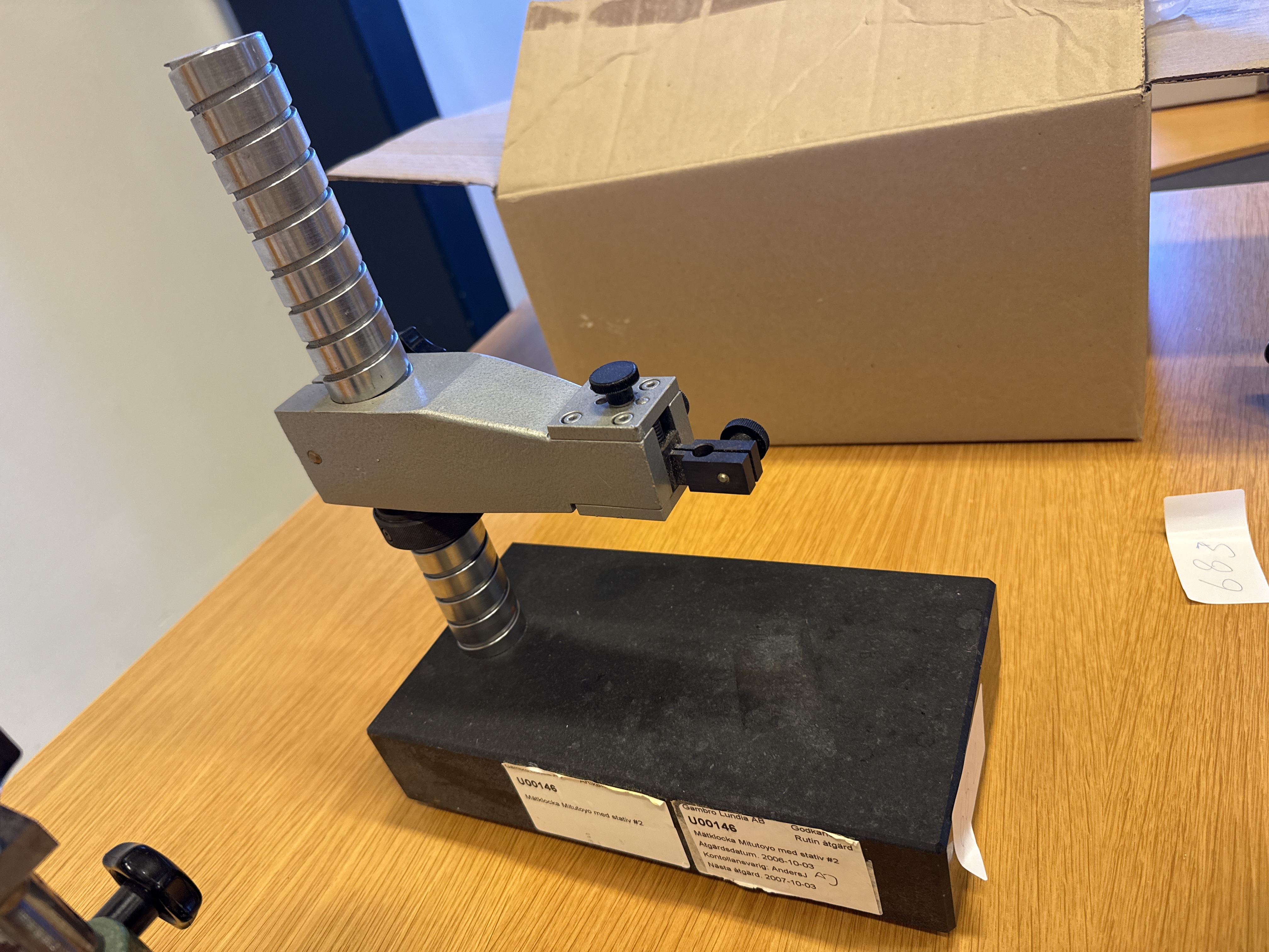 Measuring stand with granite base, specifically a Mitutoyo measuring ...