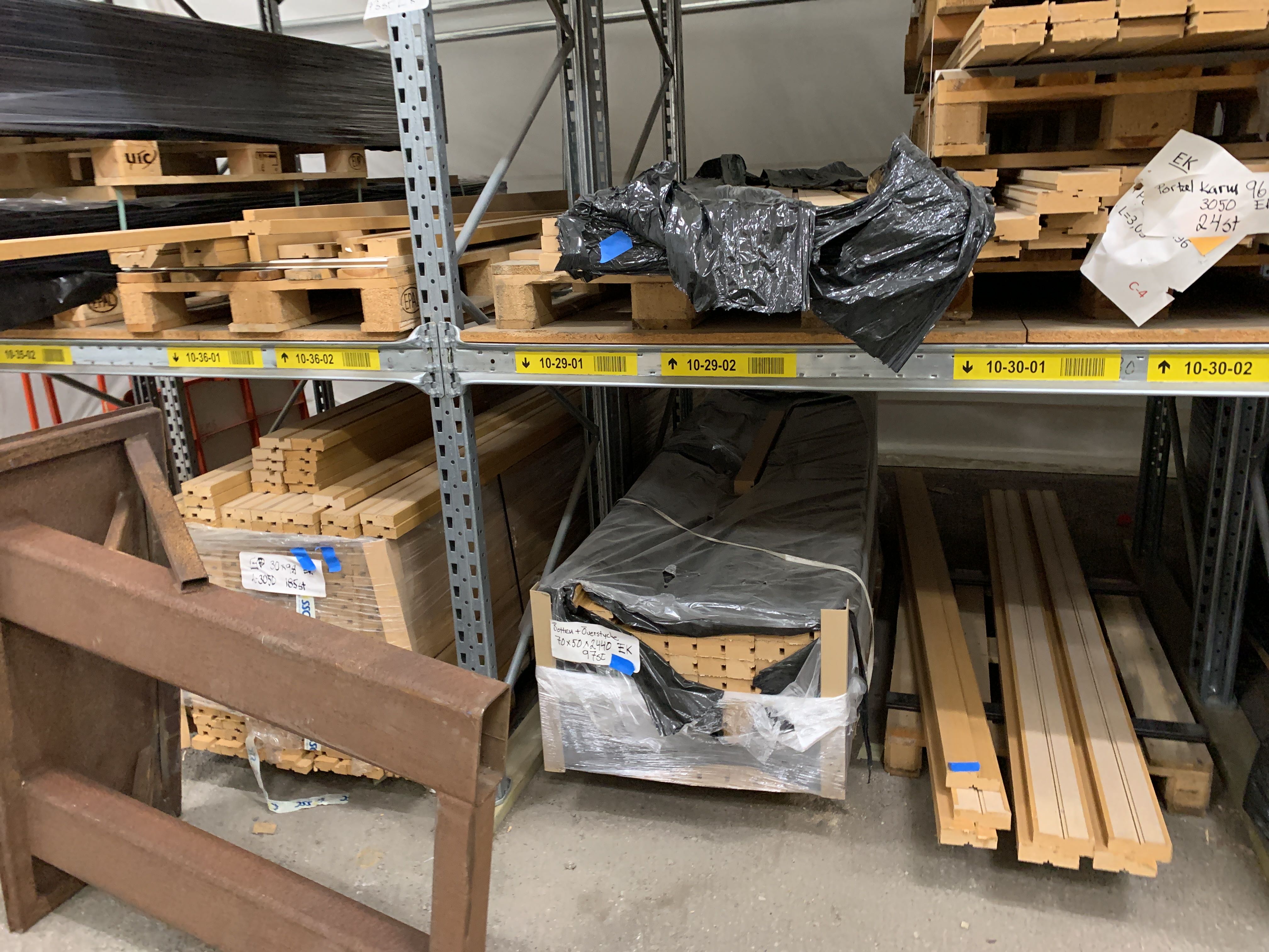Lot of wooden strips, aluminum strips and other material for office ...
