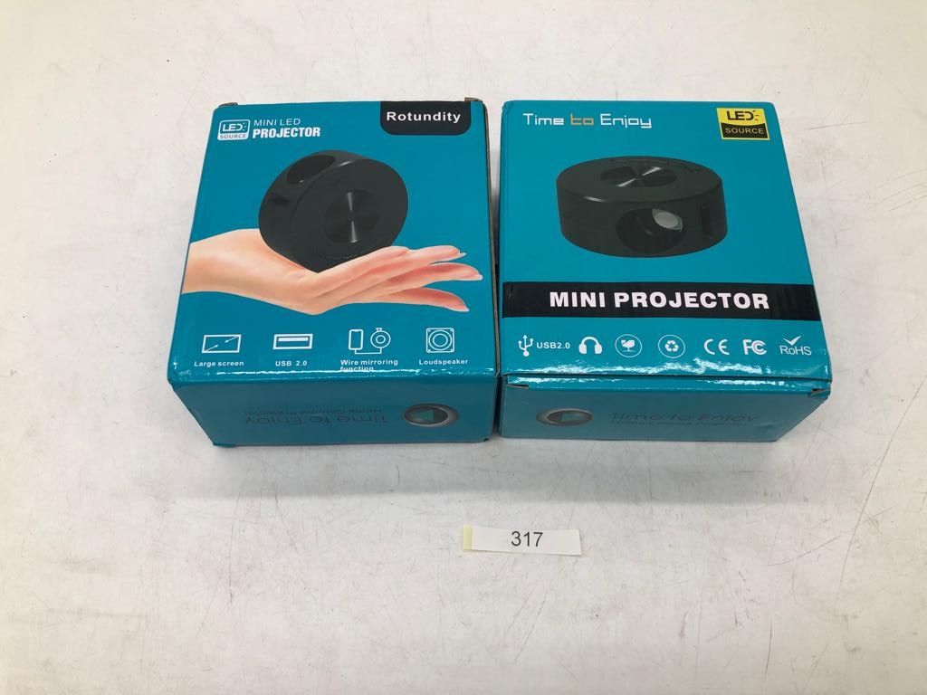 2 Mini Projectors Shipping Included 317 Ps Auction We Value The Future Largest In Net