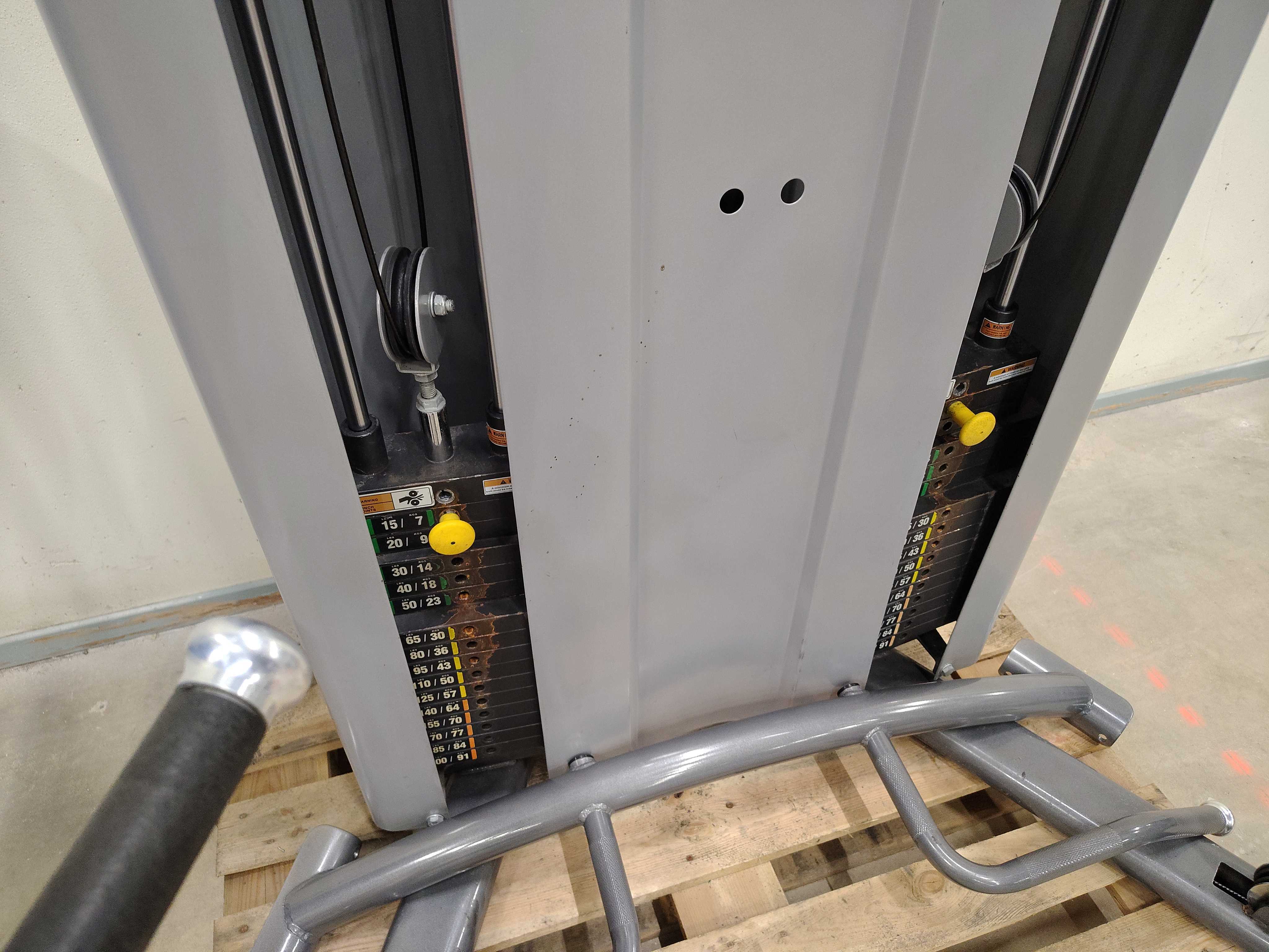 Double-sided cable machine – two weight magazines, adjustable pull ...