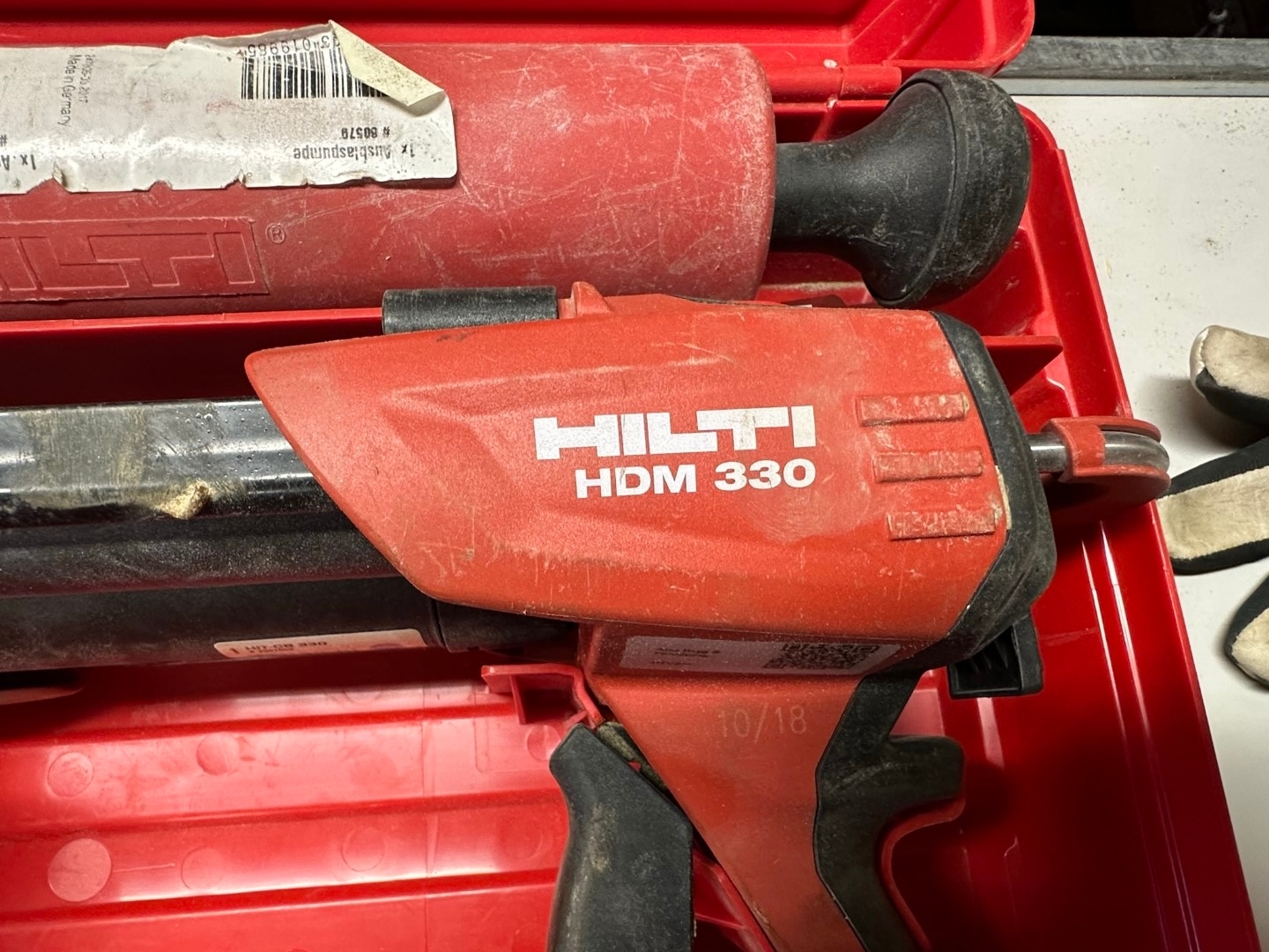 Grouting gun Hilti HDM 330 - PS Auction - We value the future - Largest in net auctions