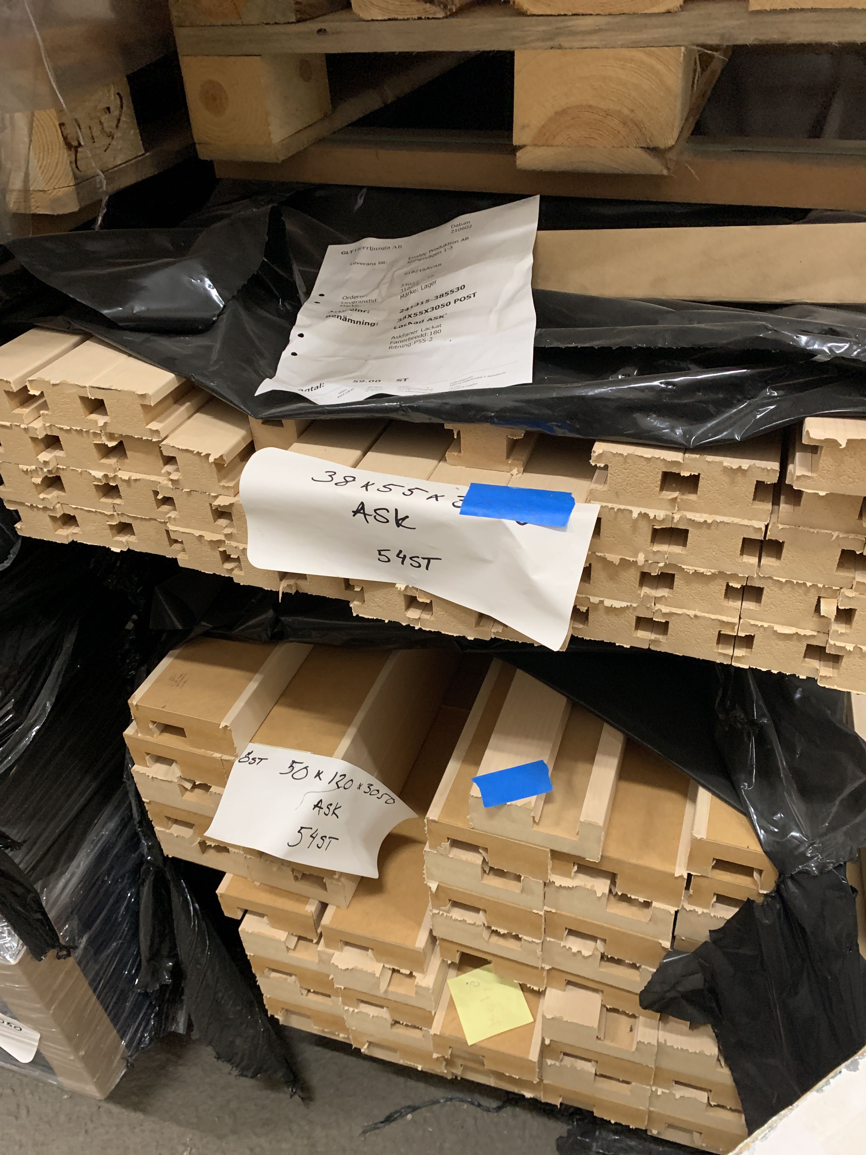 Lot of wooden strips, aluminum strips and other material for office ...