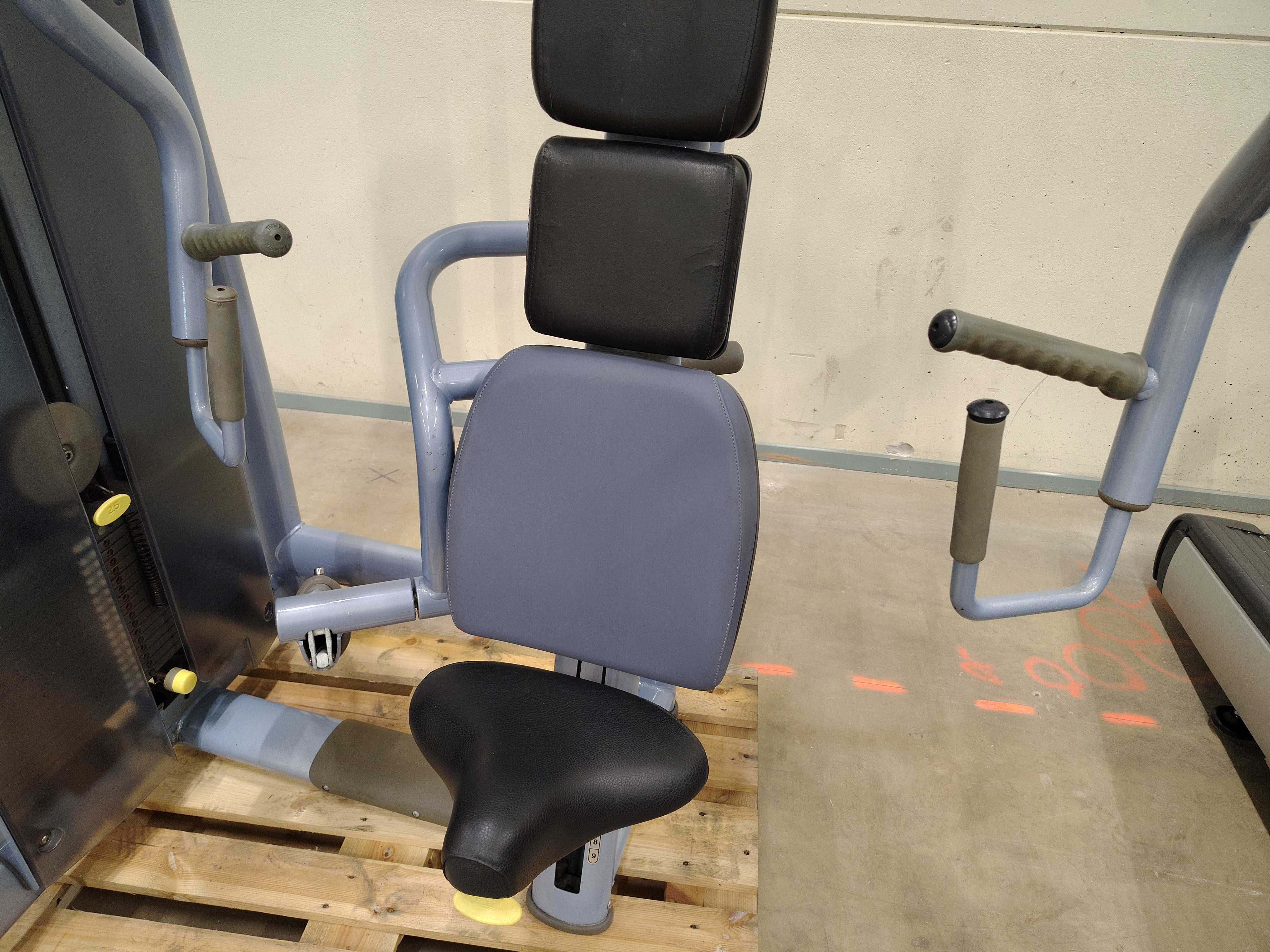 Chest press machine - Technogym - weight magazine, ergonomic handles ...