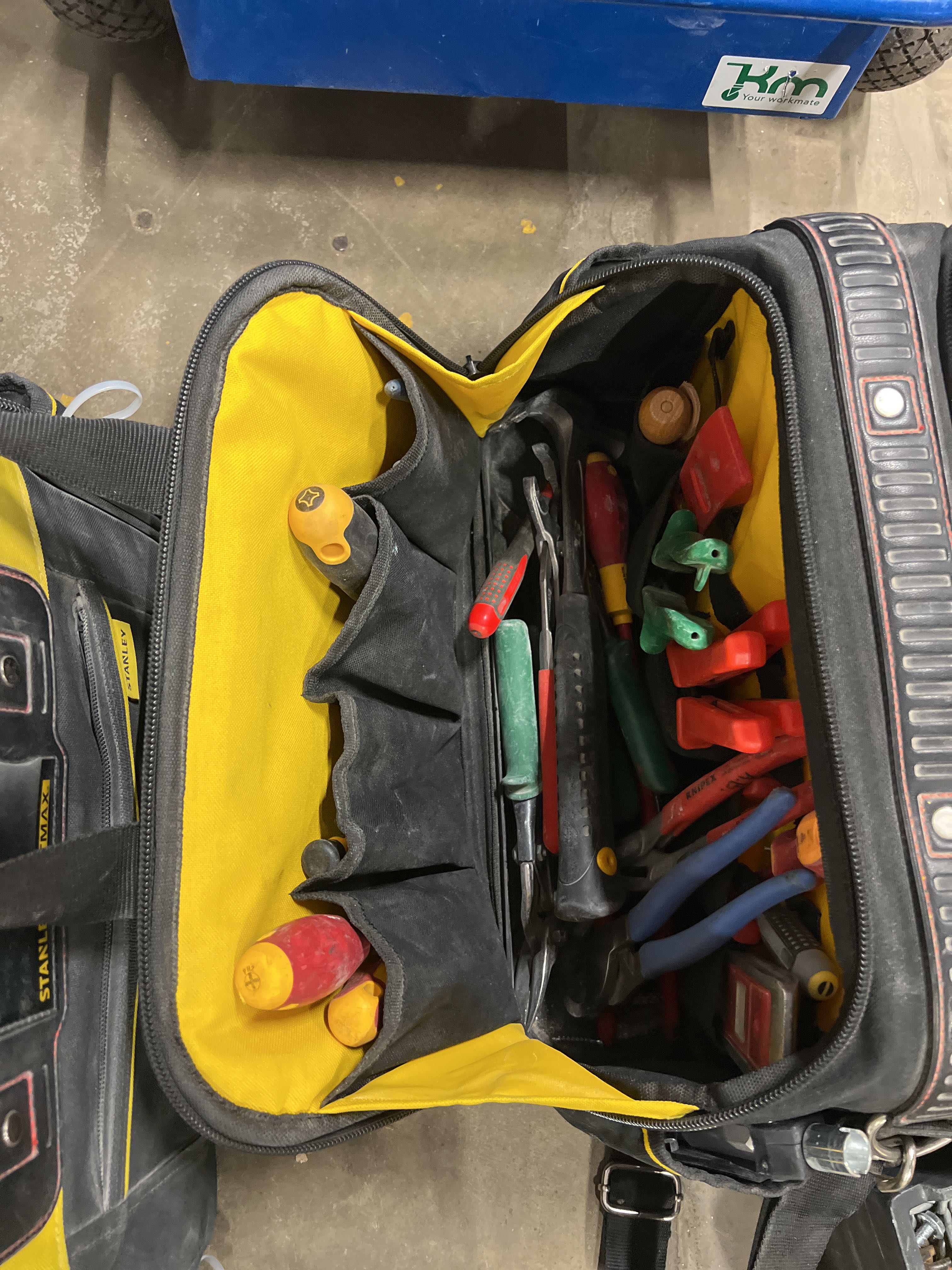 Toolbox with various tools and construction accessories - PS Auction ...