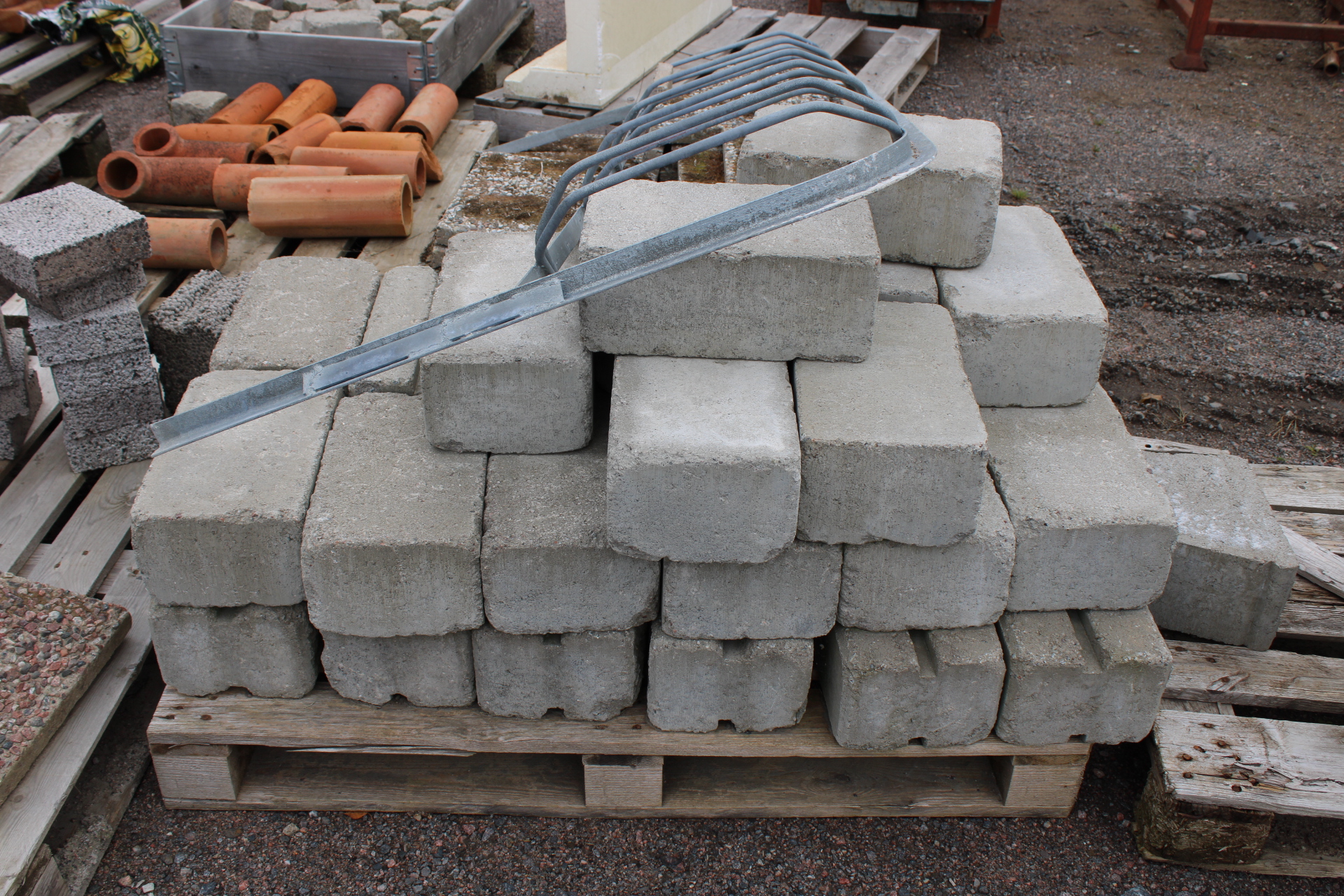 Pallets with different types of stone, tiles, paving stones etc. - PS ...