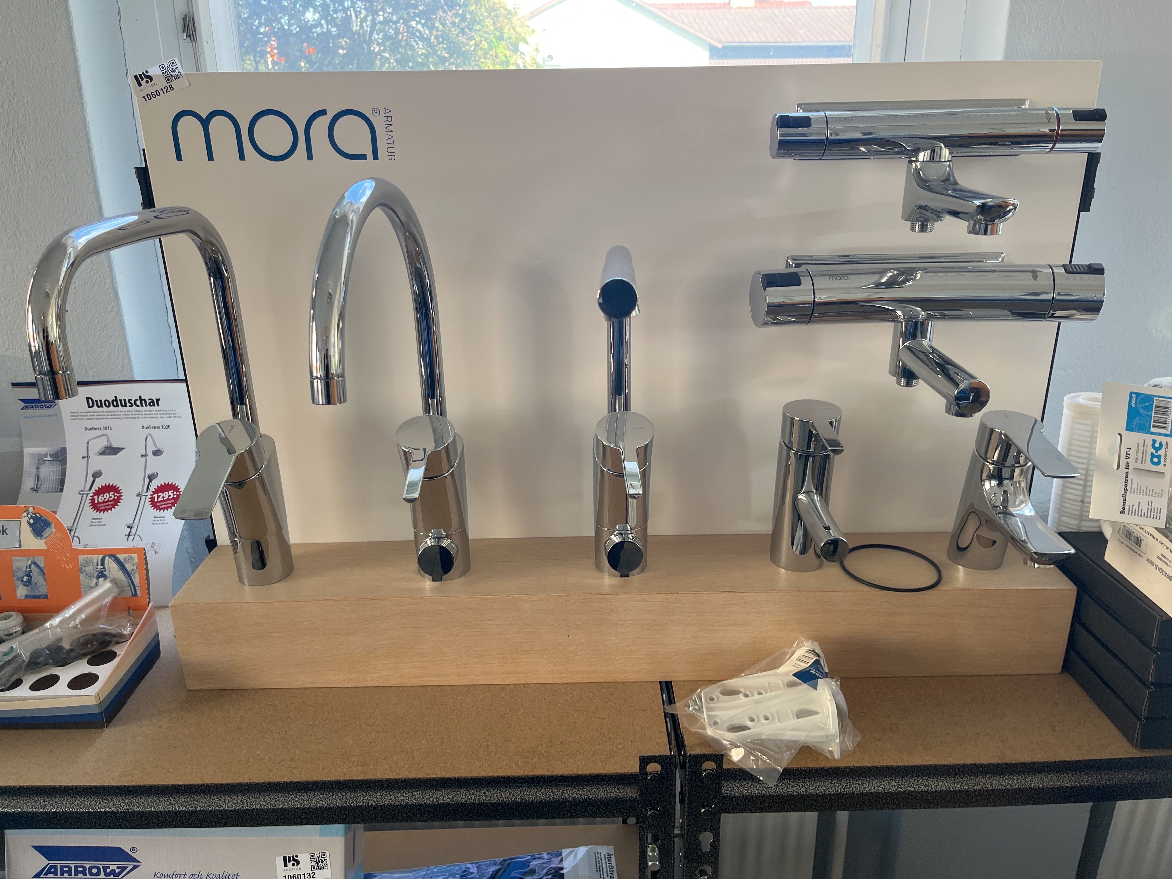 Dispaly stand with Mora taps - PS Auction - We value the future ...