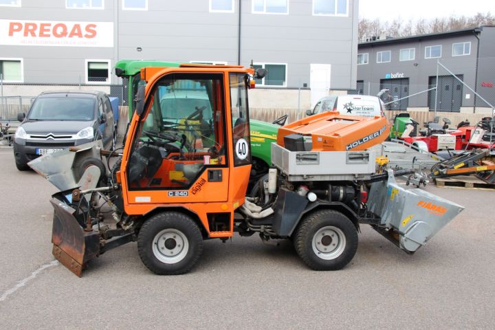 Tractor Holder C240 with folding plow and sand spreader - PS Auction ...