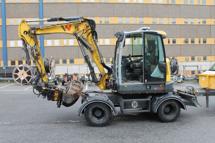 Wheeled excavator Wacker Neuson EW65 -16 Tipper trailer and buckets ...
