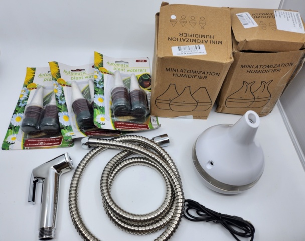 2 humidifiers, 3 self-watering kits & water hose with sprayer ...
