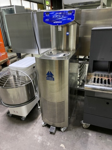 Tempering machine for chocolate. A grid is probably missing, but can be ...