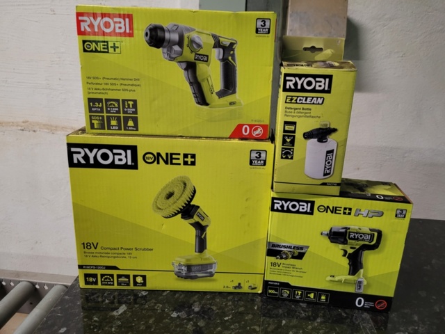 Ryobi Scrubber Battery 2Ah & Nut Driver & Hammer Drill - PS Auction ...