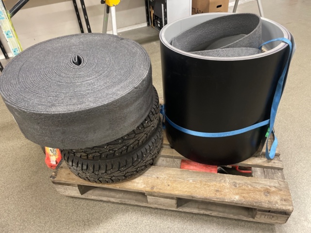 2 studded tires on rim, sheet metal strips, sheet metal roll, T-syll ...
