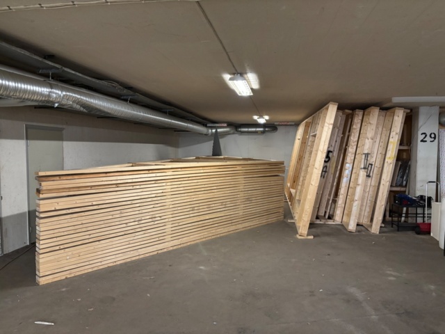 Wooden frames with roof trusses and interior walls in various lengths ...